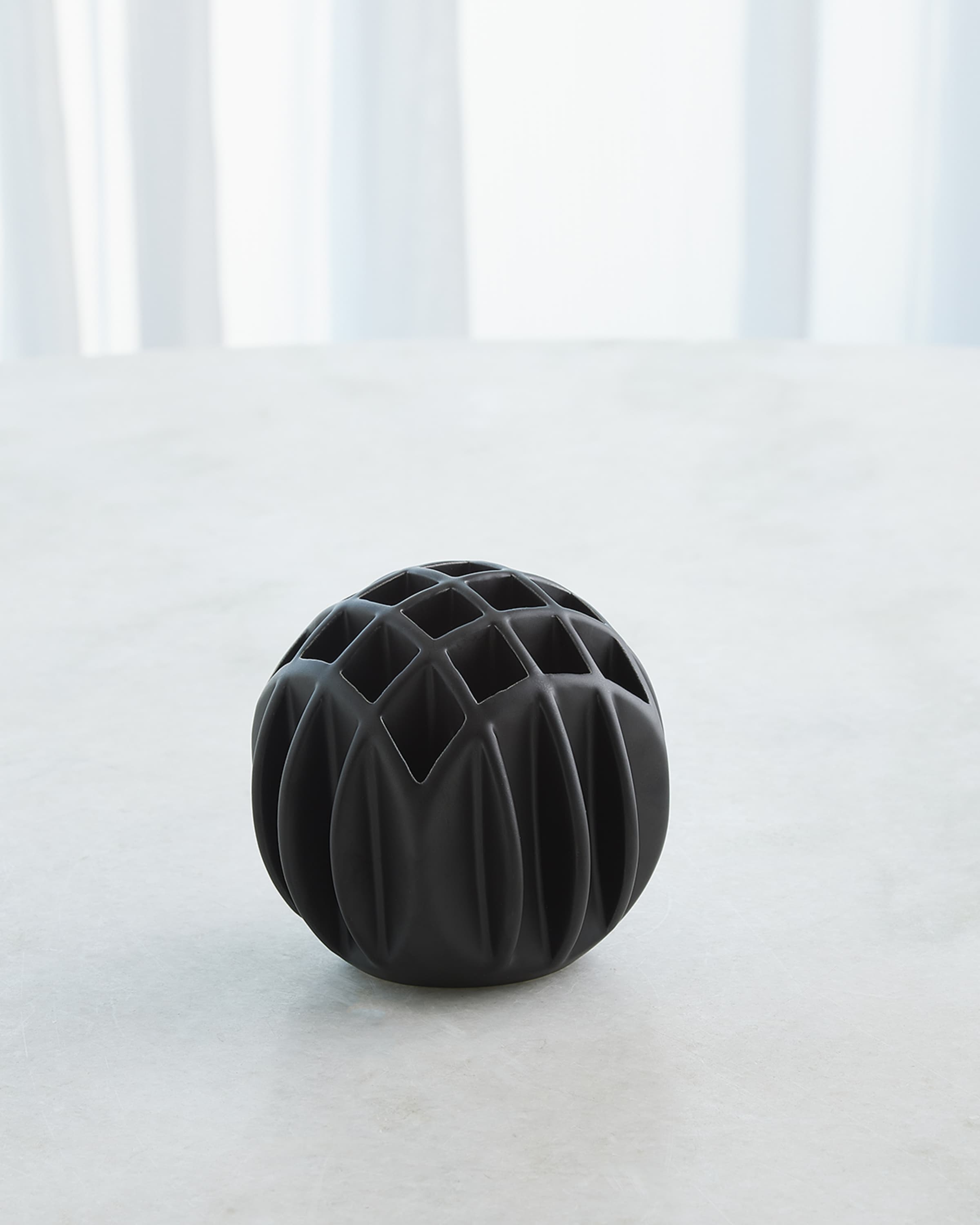 black sphere vase
